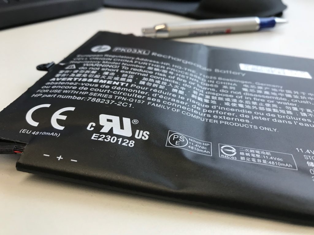 How do I dispose of a bloated lithium ion battery correctly?